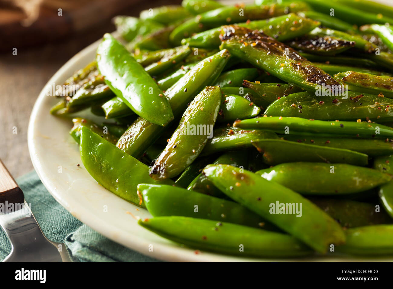 Homemade Sauteed Sugar Snap Peas Ready to Eat Stock Photo - Alamy