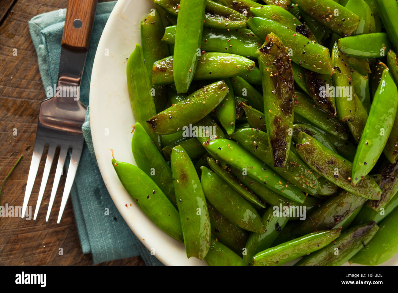 Homemade Sauteed Sugar Snap Peas Ready to Eat Stock Photo - Alamy