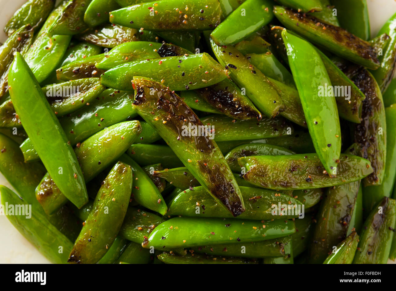 Homemade Sauteed Sugar Snap Peas Ready to Eat Stock Photo - Alamy