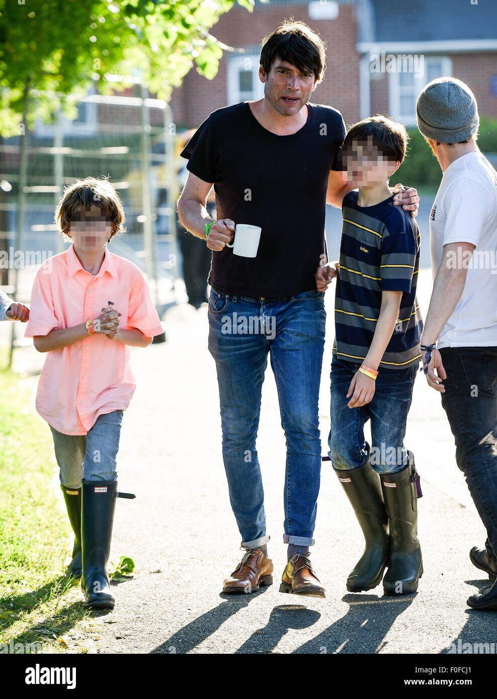 Alex James and his kids backstage at the Isle of Wight Festival 2015 ...