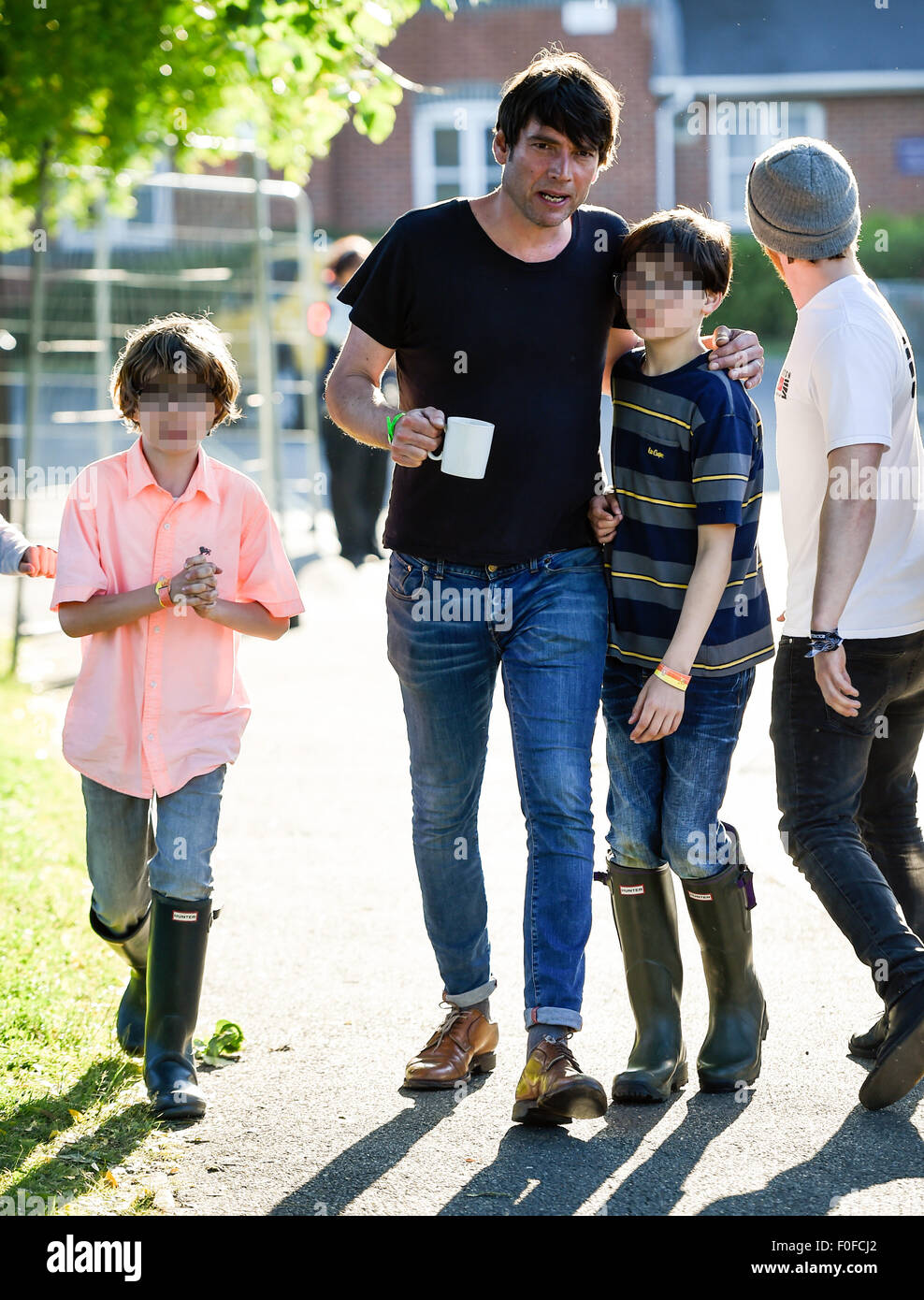 Alex James and his kids backstage at the Isle of Wight Festival 2015 ...
