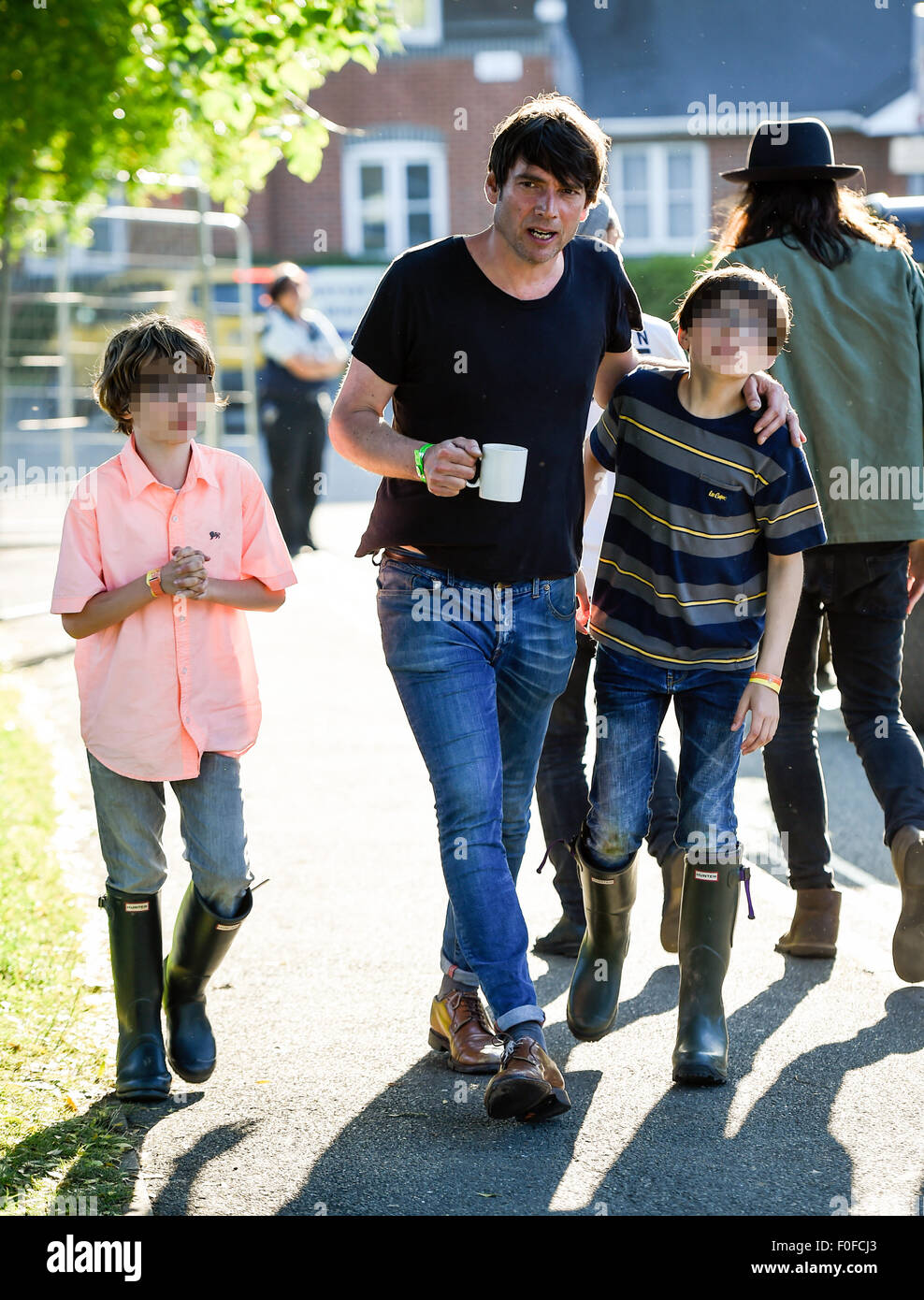 Alex James and his kids backstage at the Isle of Wight Festival 2015 ...
