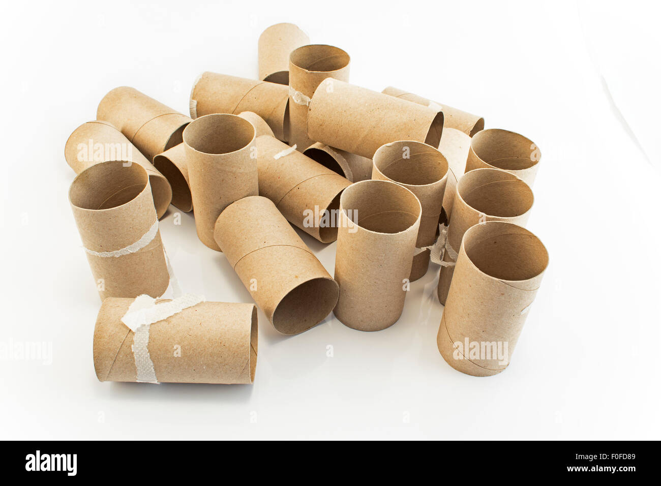 Empty toilet paper rolls isolated on white Stock Photo - Alamy