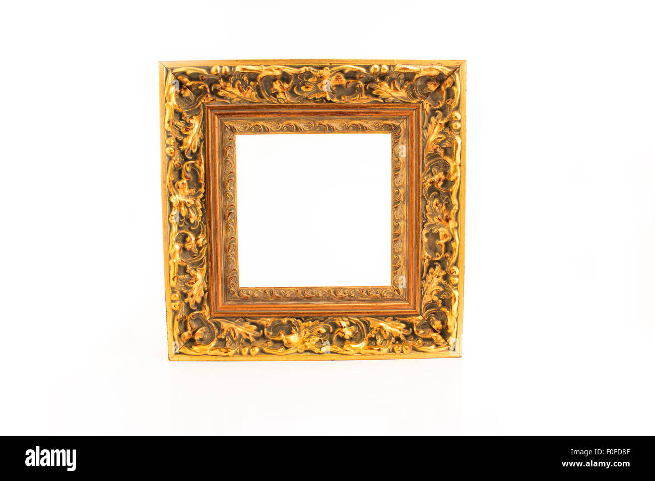 Golden frame, isolated on white Stock Photo - Alamy
