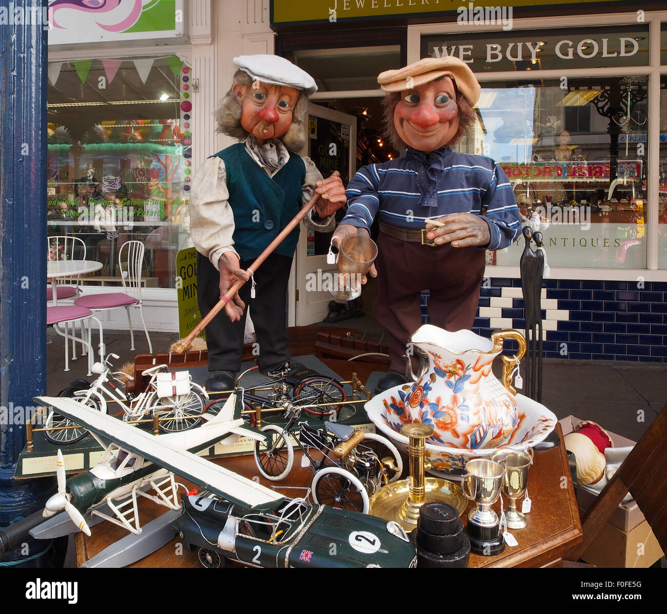 Display outside an antiques shop in Llandudno, North Wales Stock Photo ...