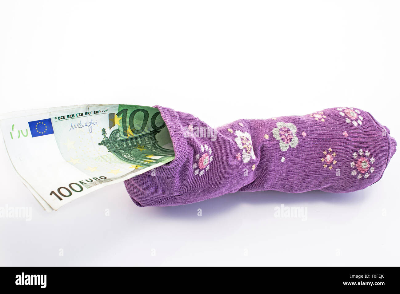 Money in a sock isolated on white Stock Photo - Alamy