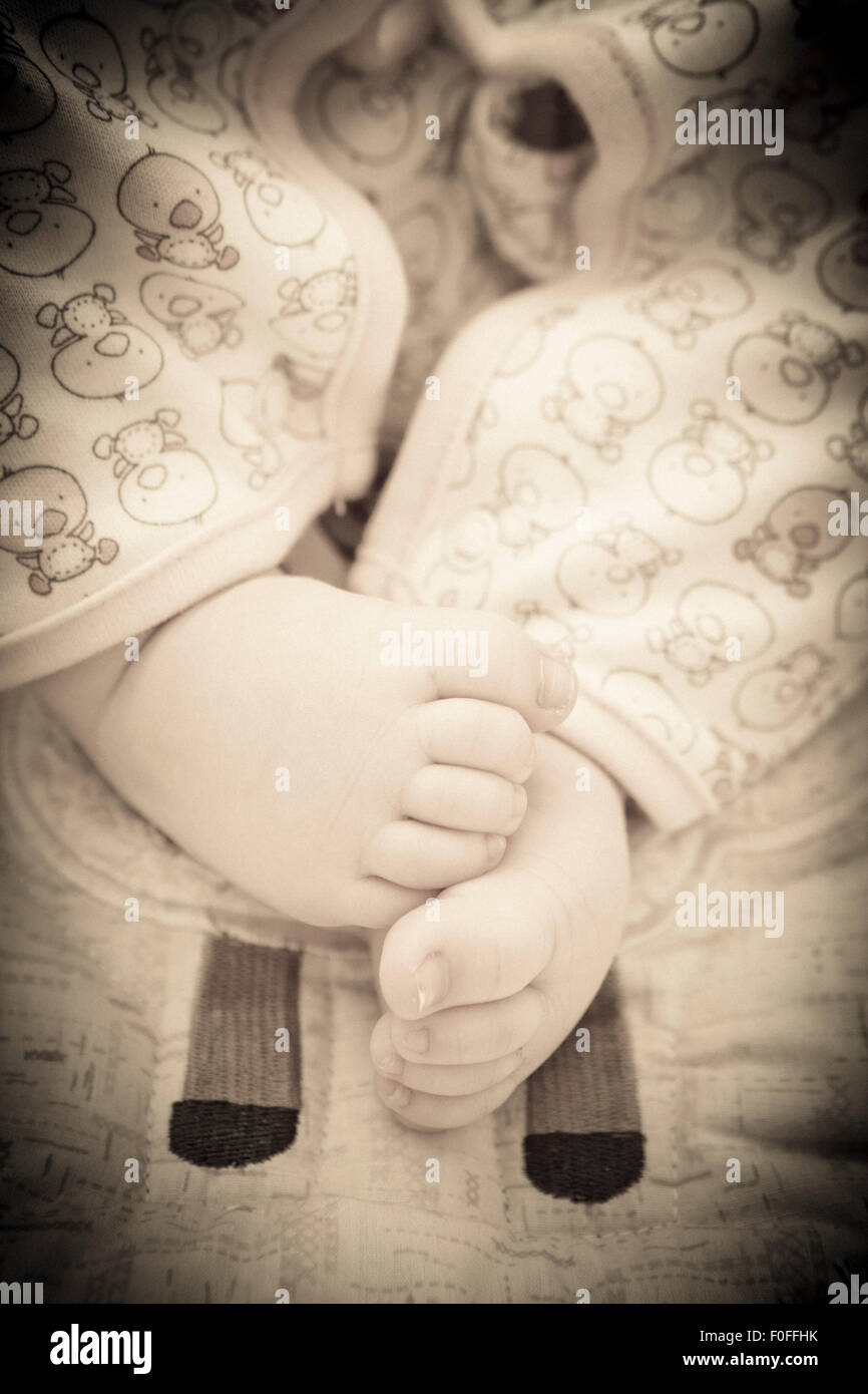 Baby crib feet hi-res stock photography and images - Alamy