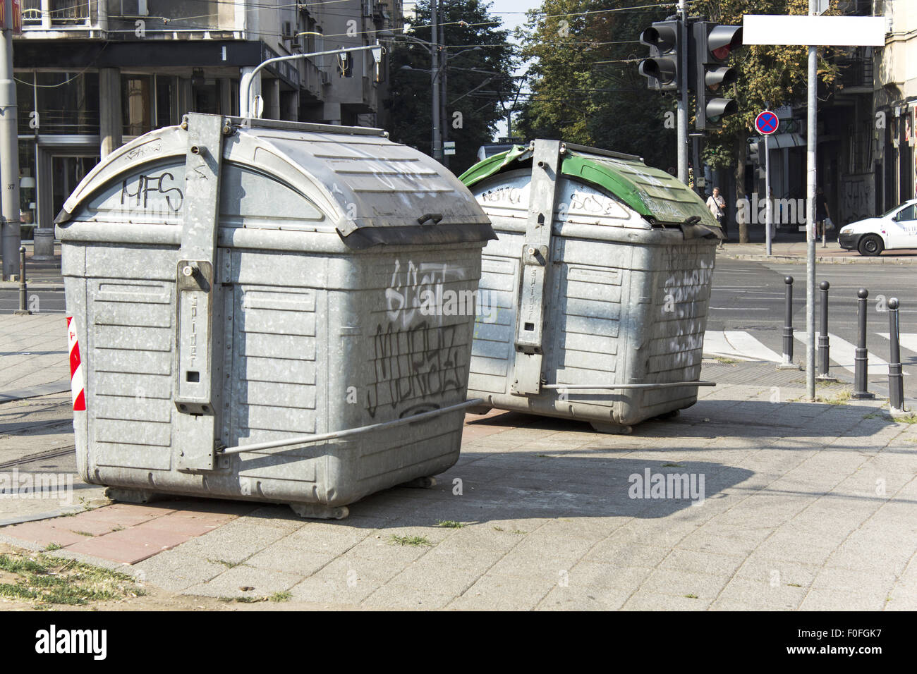 Two dumpsters in the city Stock Photo - Alamy