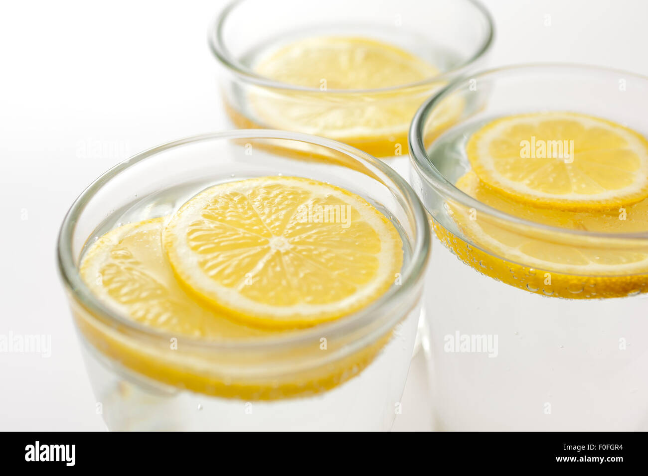 Fresh lemon slices in sparkling water glasses Stock Photo - Alamy