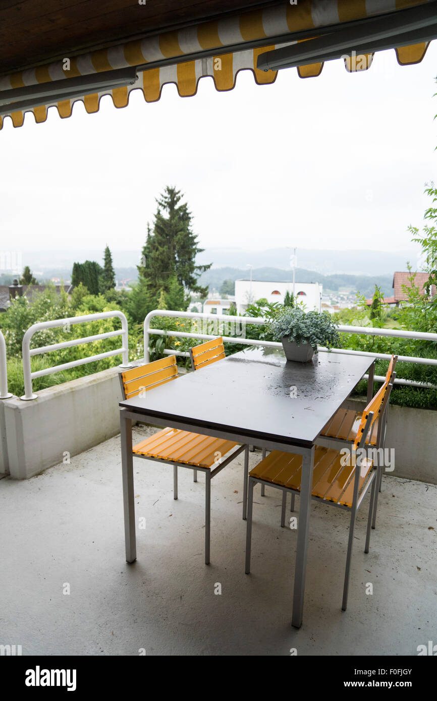 A patio table upon the Swiss Alps Stock Photo - Alamy