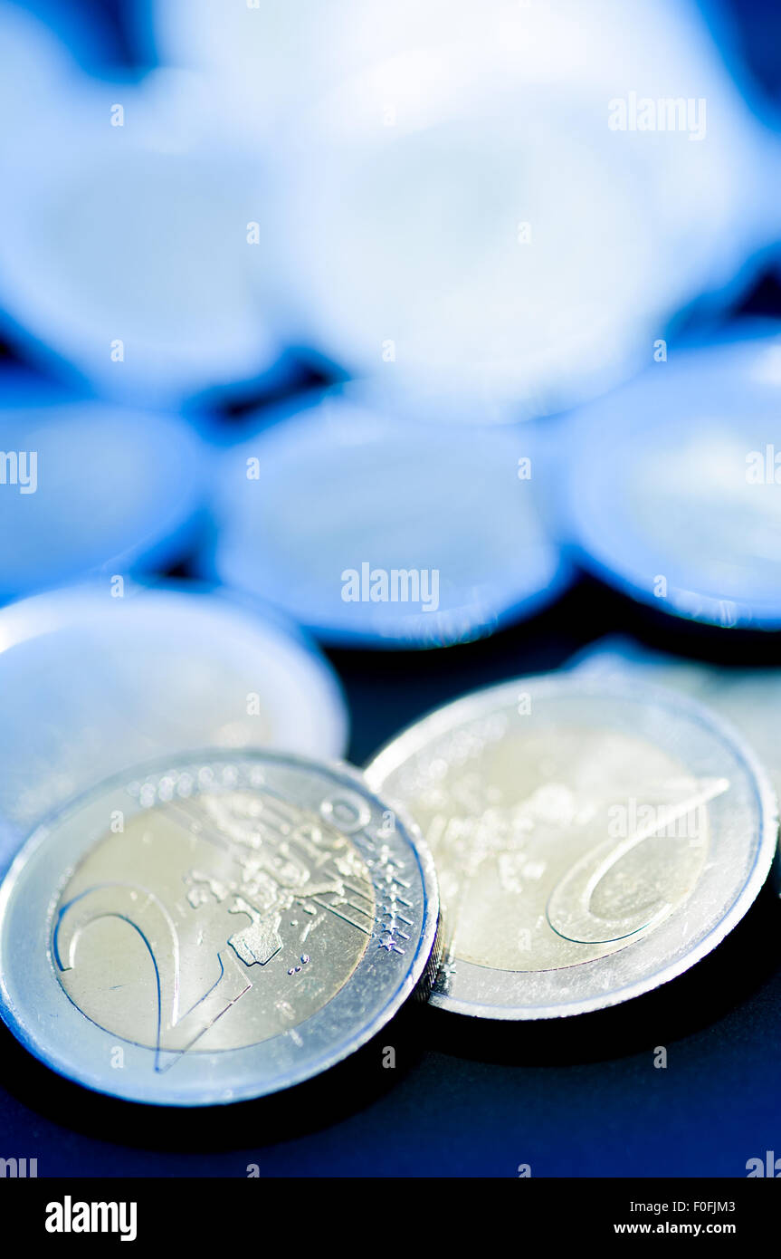 Stack of 2 Euro coins depicting financial concept Stock Photo - Alamy