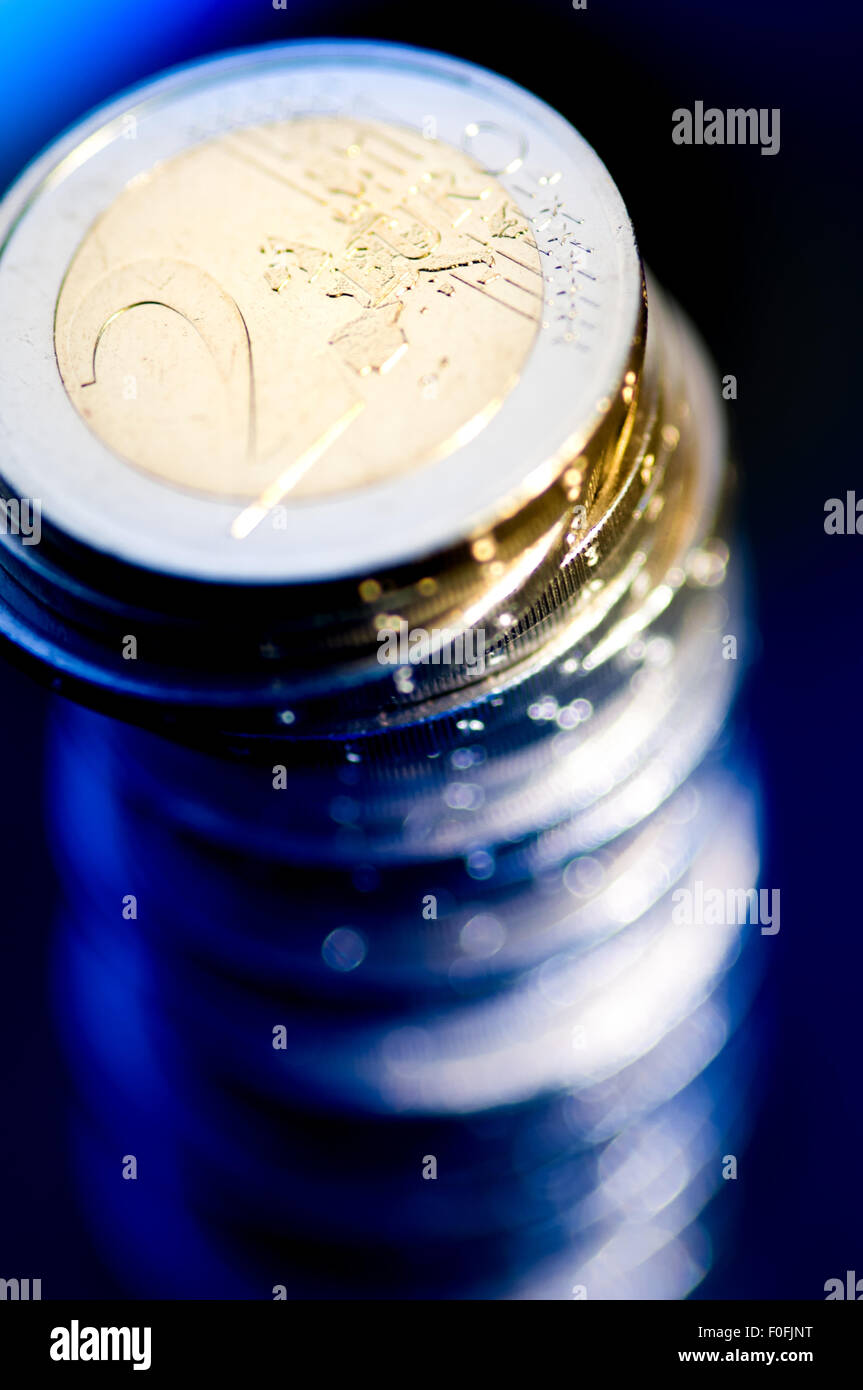 Stack of 2 Euro coins depicting financial concept Stock Photo - Alamy