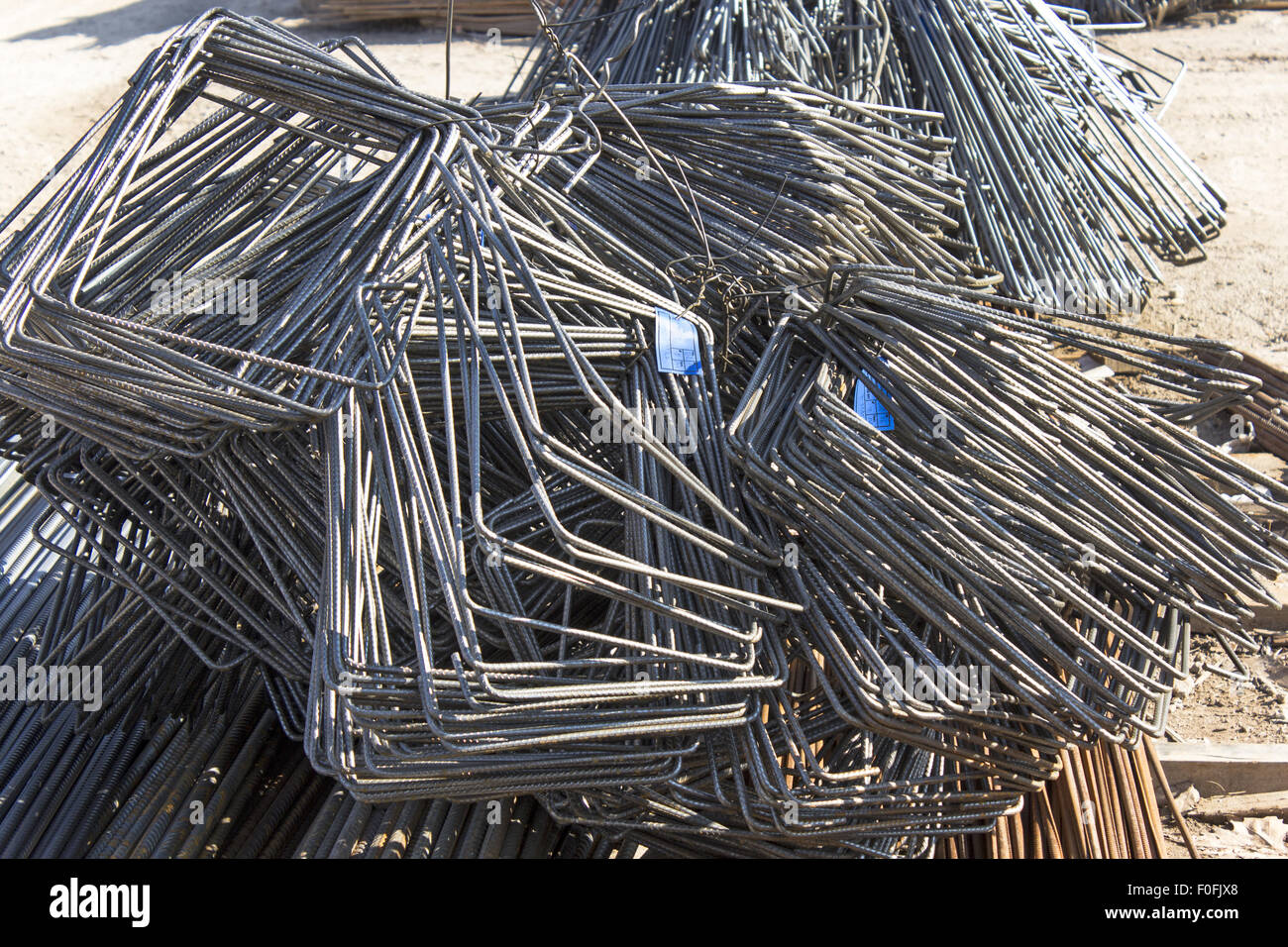 Steel rod bent into squares Stock Photo - Alamy