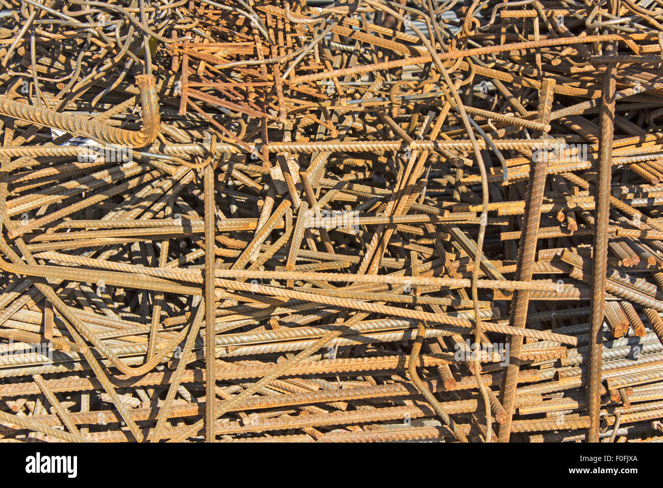 A pile of rusty iron rods Stock Photo - Alamy