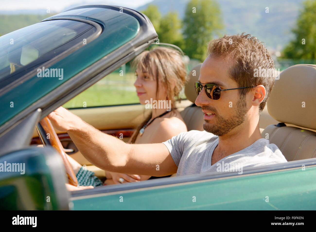 Couple convertible hi-res stock photography and images - Alamy