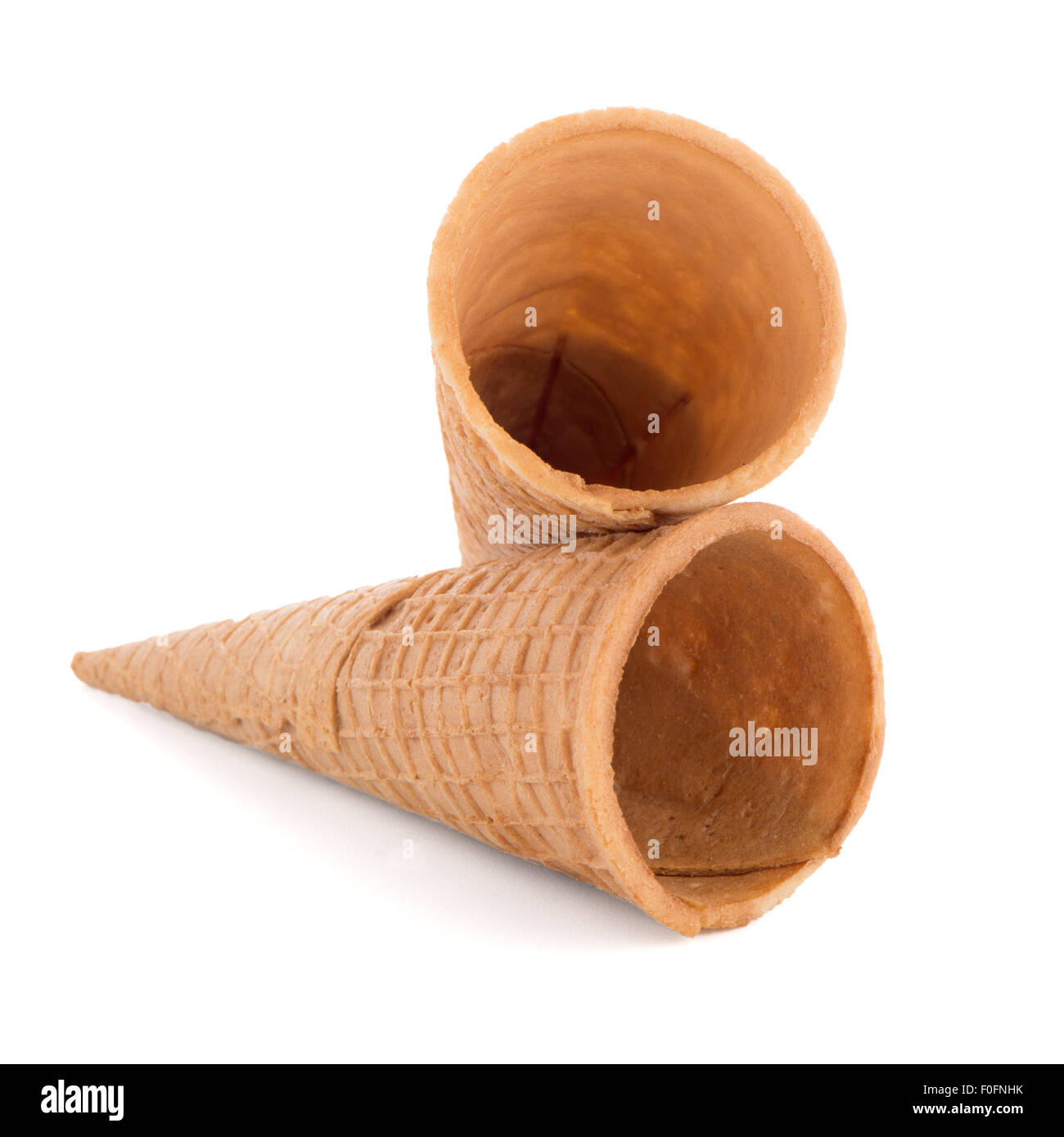 Wafer cones on white background Stock Photo - Alamy