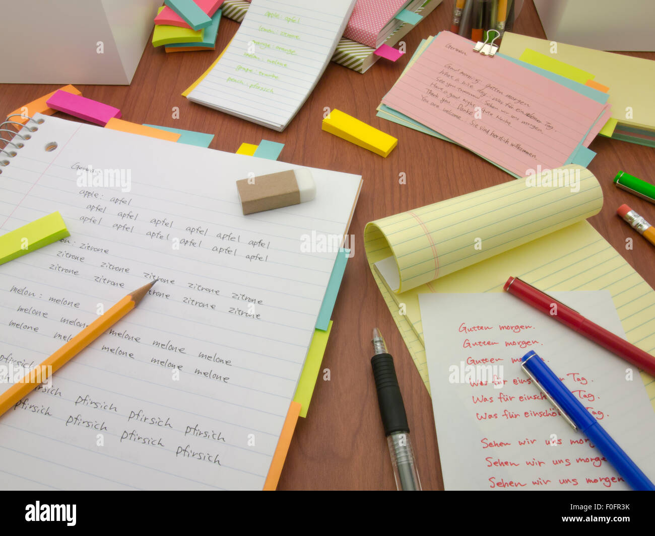 Writing new words again and again to learn new language Stock Photo - Alamy