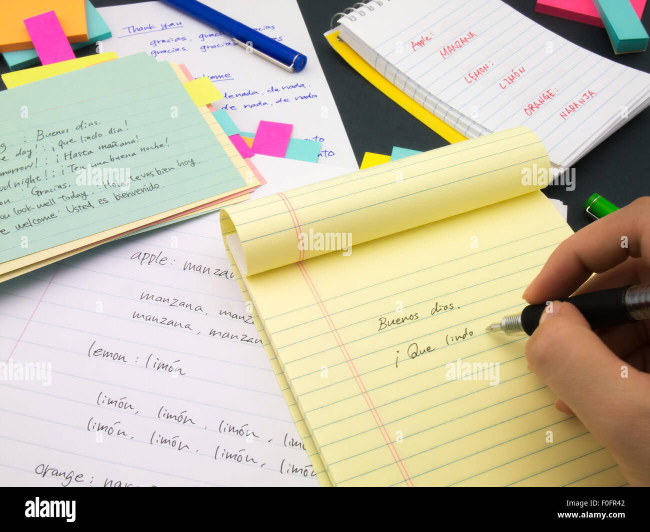 Writing new words again and again to learn new language Stock Photo - Alamy