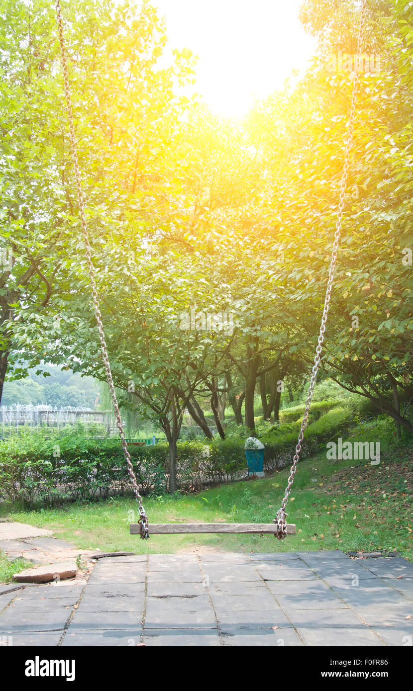 Tree with swing park hi-res stock photography and images - Alamy