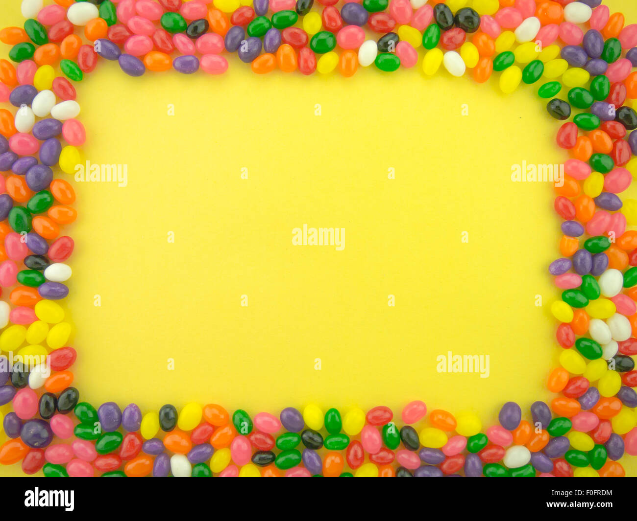 Frame and background made of colorful jelly beans Stock Photo - Alamy