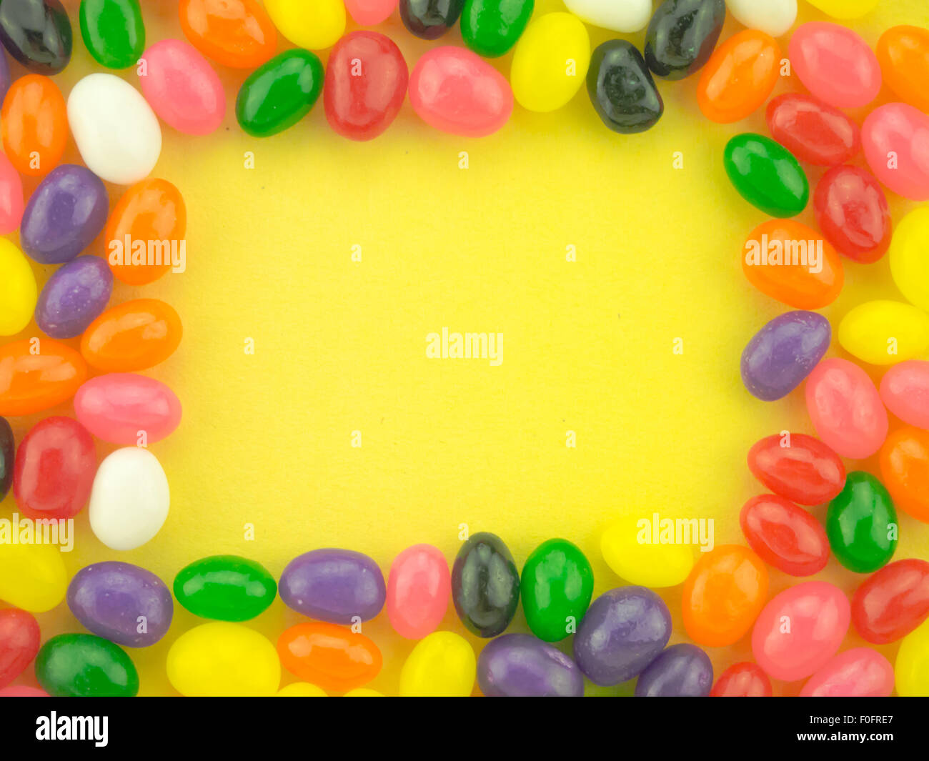 Frame and background made of colorful jelly beans Stock Photo - Alamy