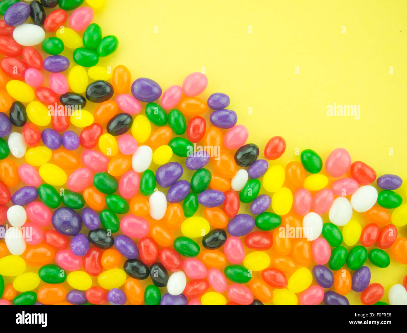 Frame and background made of colorful jelly beans Stock Photo - Alamy