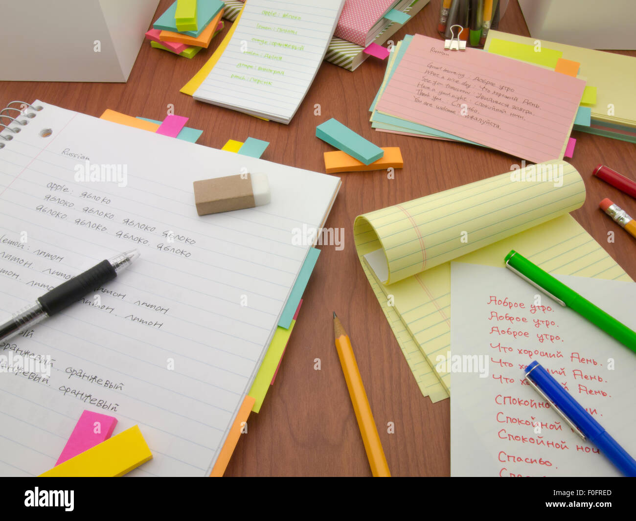 Writing new words again and again to learn new language Stock Photo - Alamy