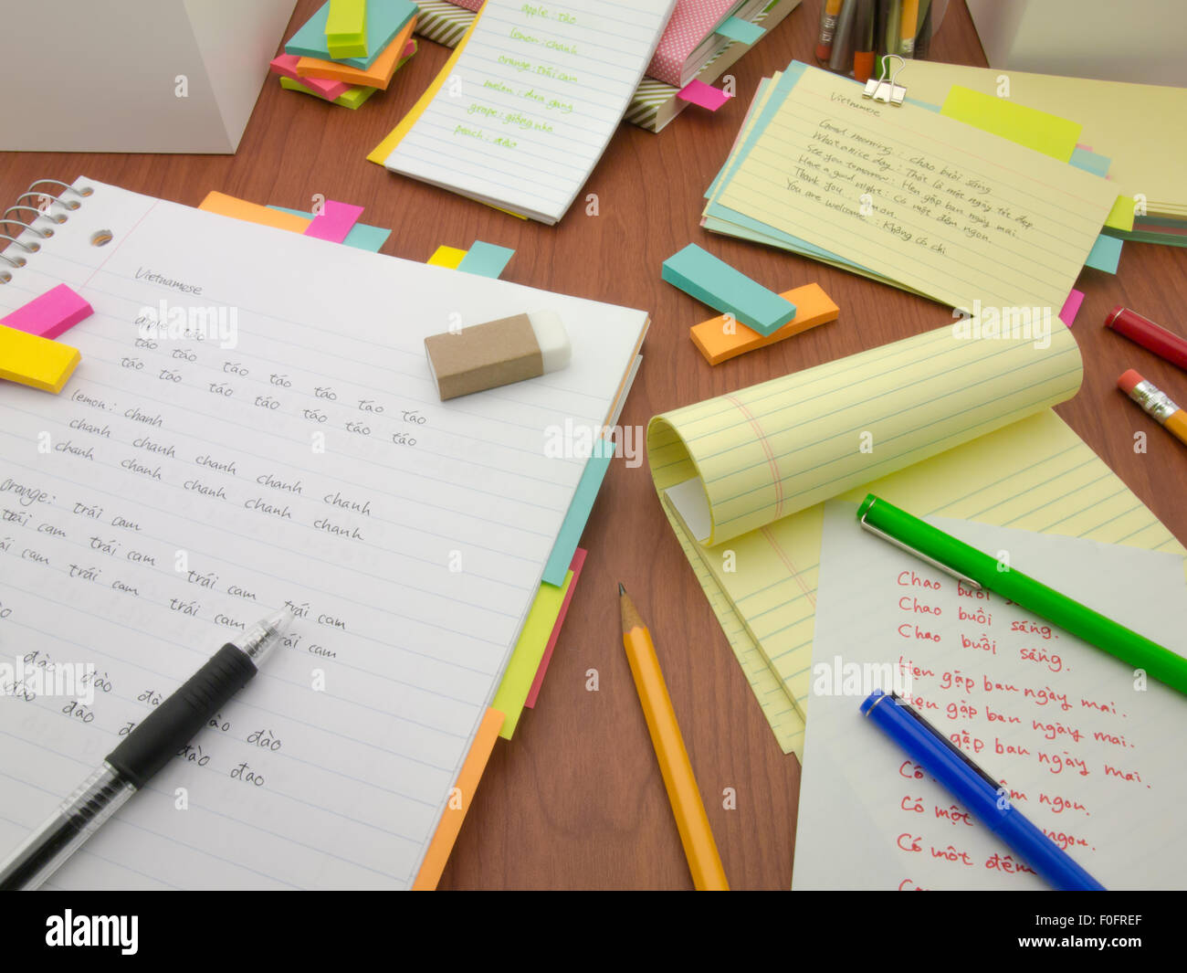 Writing new words again and again to learn new language Stock Photo - Alamy