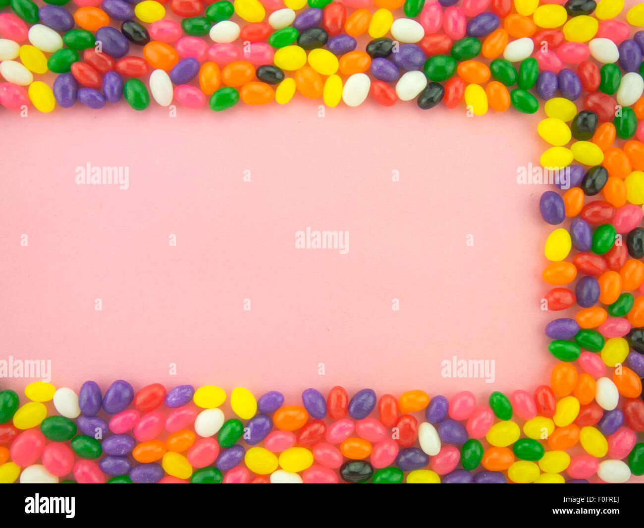 Frame and background made of colorful jelly beans Stock Photo - Alamy