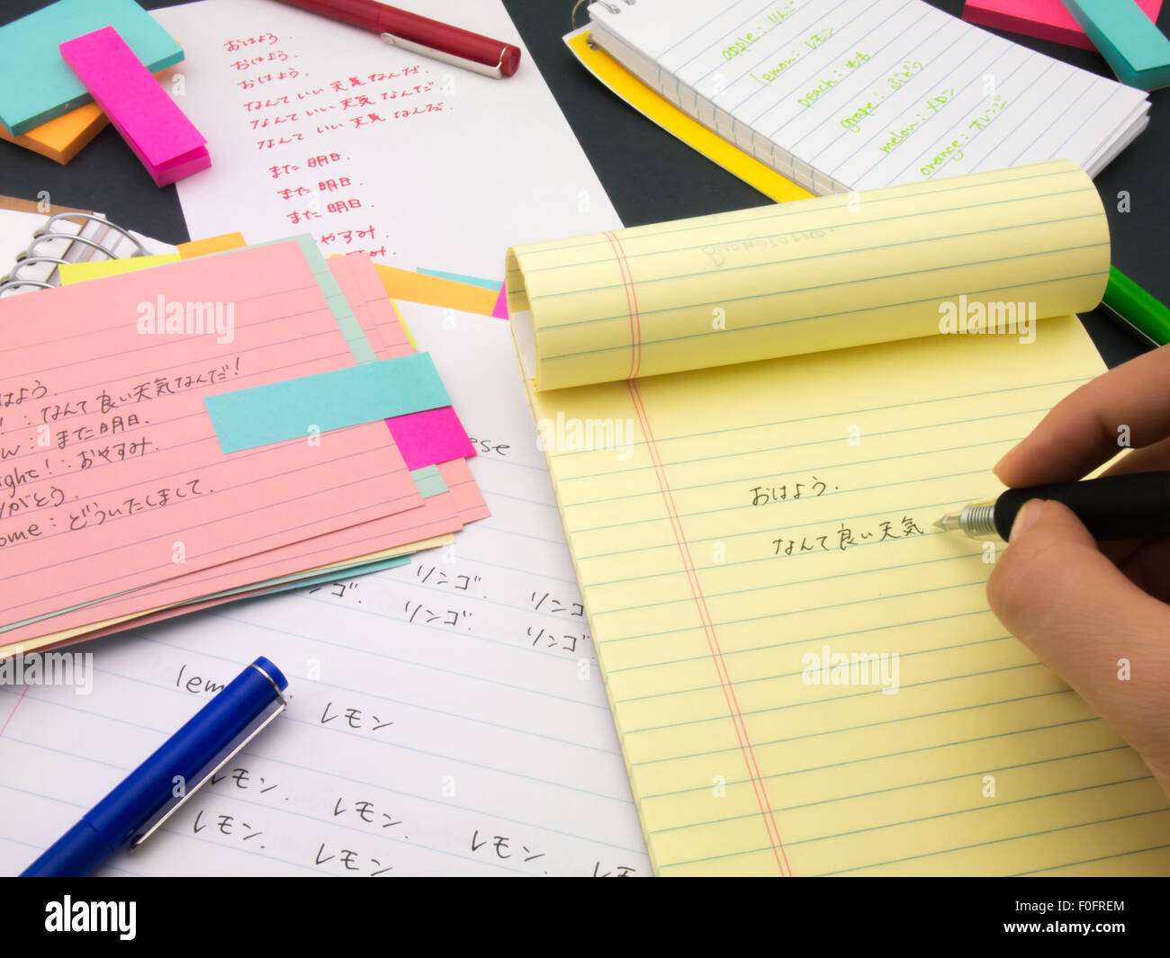 Writing new words again and again to learn new language Stock Photo - Alamy