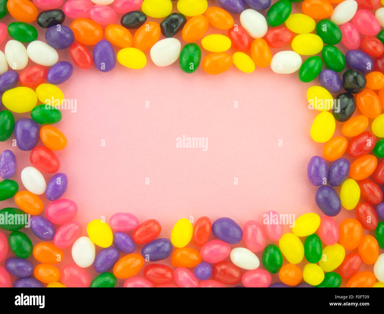 Frame and background made of colorful jelly beans Stock Photo - Alamy