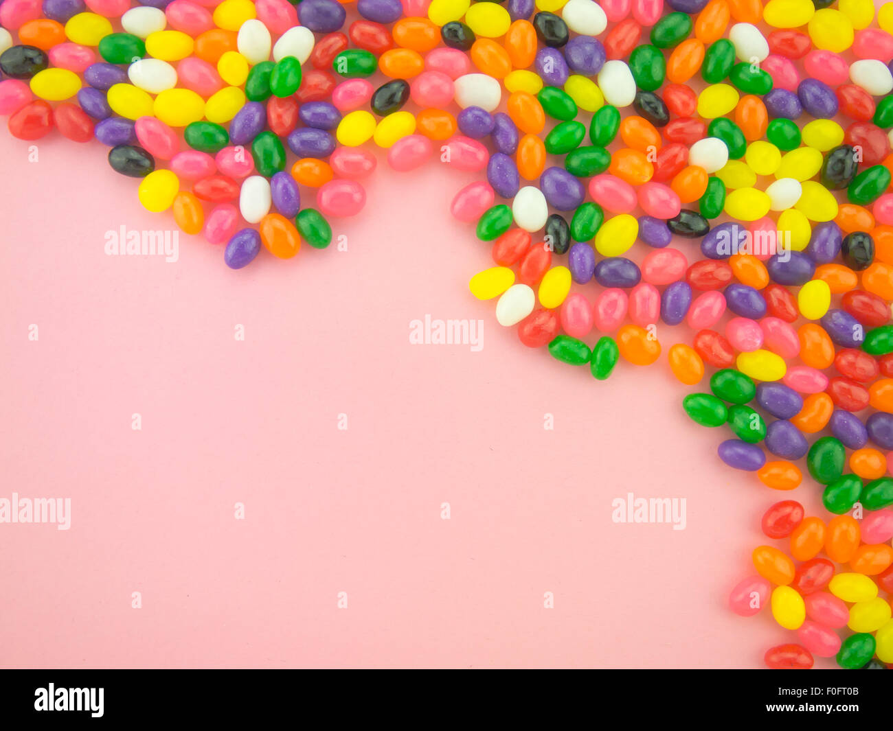 Frame and background made of colorful jelly beans Stock Photo - Alamy