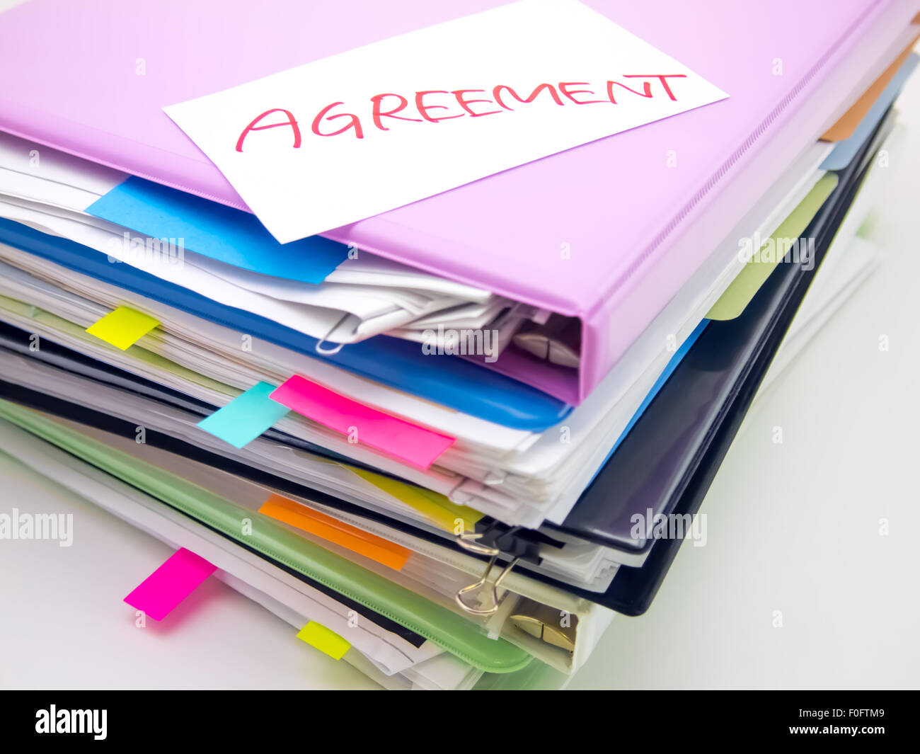 There is the huge pile of business documents on the desk Stock Photo ...