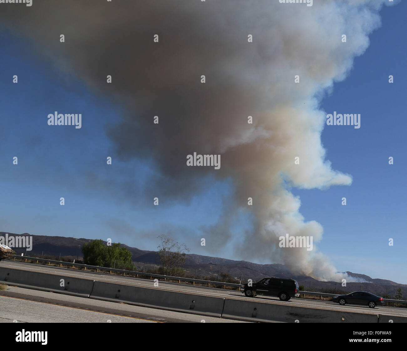 Simi Valley CA. 14th Aug, 2015. Firefighters battle a 180 acre brush ...