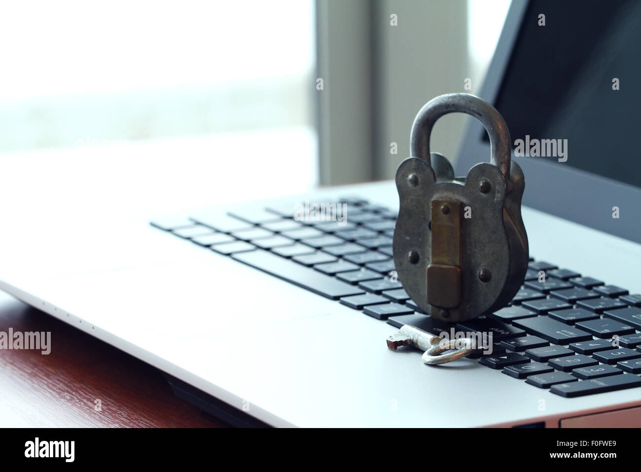 Old key on computer keyboard hi-res stock photography and images - Alamy