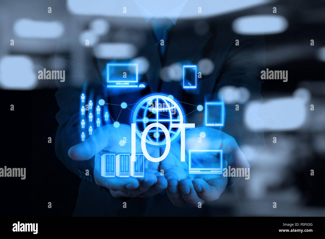 double exposure of hand showing Internet of things (IoT) word diagram ...