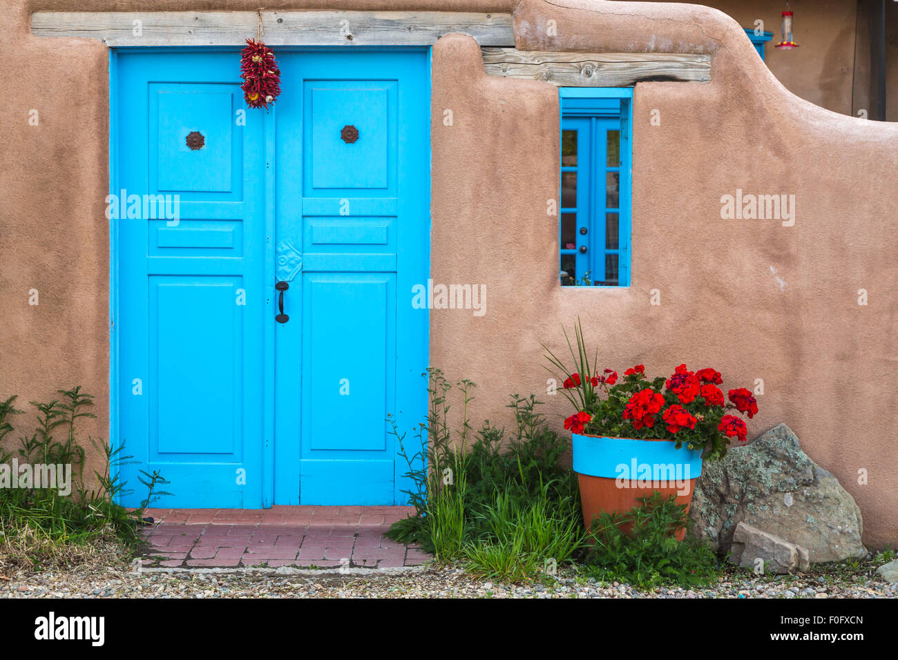 Blue window and door adobe architecture in Rancho de Taos, New Mexico ...
