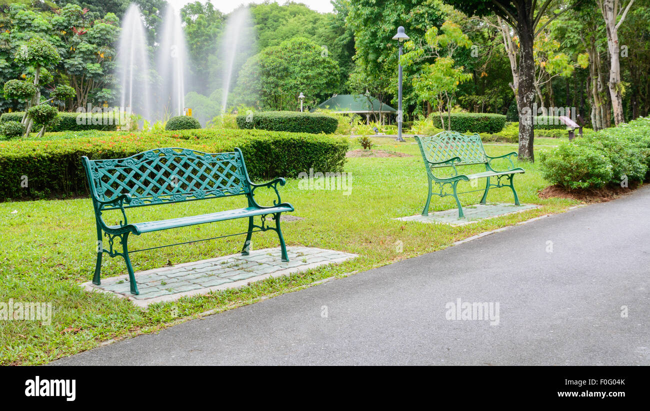 relaxing bench, chair, stool beside walkway in the public park, wait ...