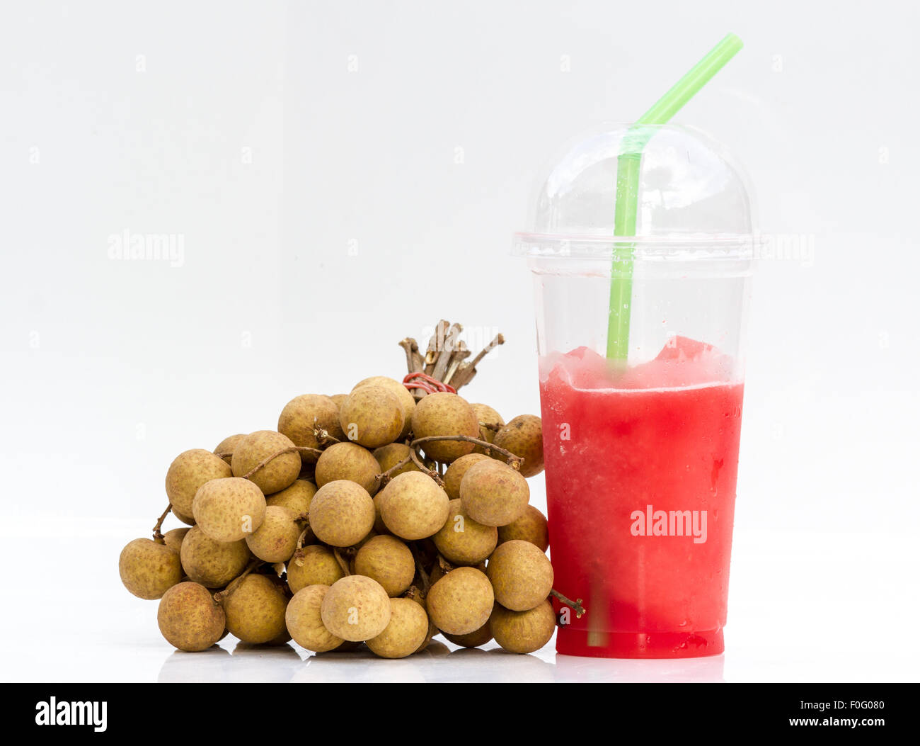 Longan, watermelon juice on white table Stock Photo - Alamy