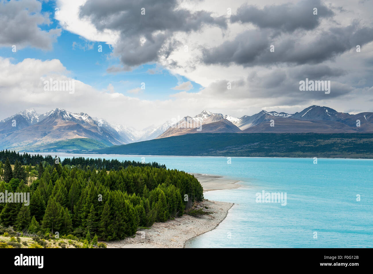 Mountains and forest trees on the road leading out of Mount Cook ...