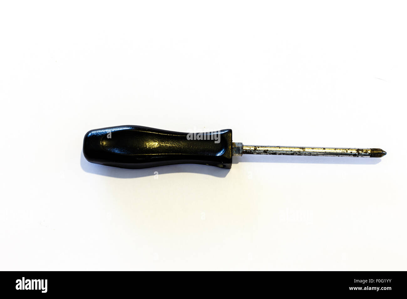 black screwdriver isolated on white Stock Photo - Alamy