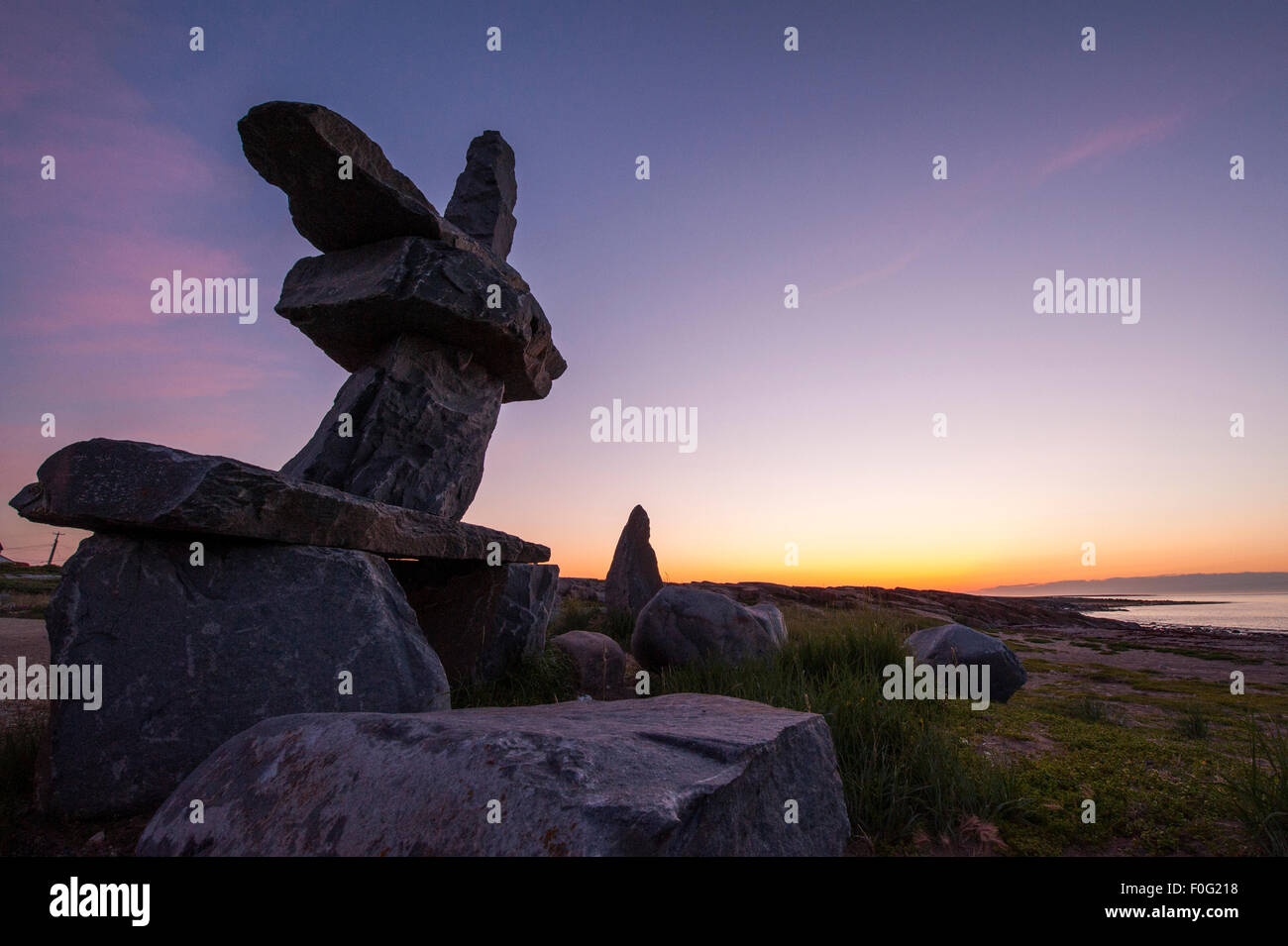 Inukshuk monument Churchill at sunset, Manitoba, Canada Stock Photo - Alamy