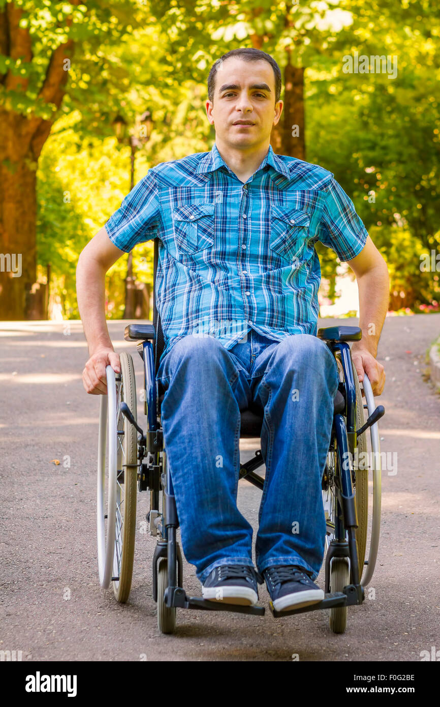 Happy disabled man in wheelchair hi-res stock photography and images ...