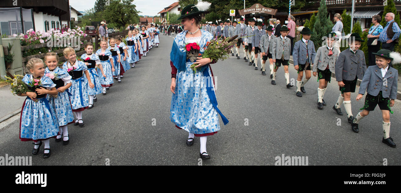 Kochel am See, Germany. 15th August, 2015. Girls and boys wearing ...