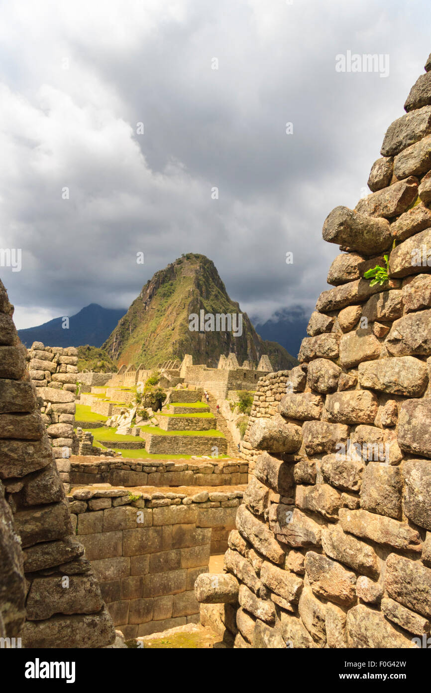 Ancient architecture and ruins of the famous Inca city at Machu Picchu ...
