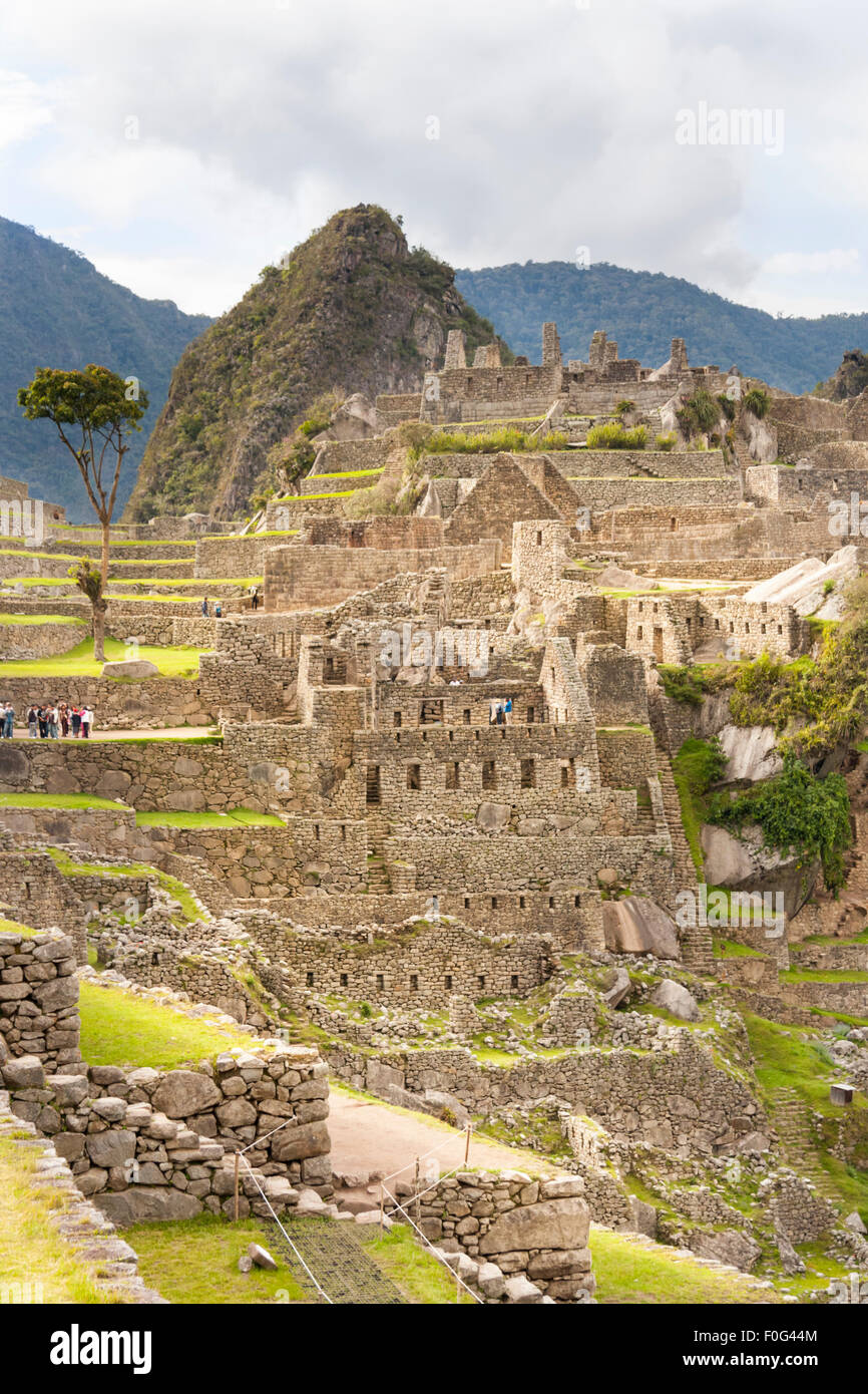 Ancient architecture and ruins of the famous Inca city at Machu Picchu ...