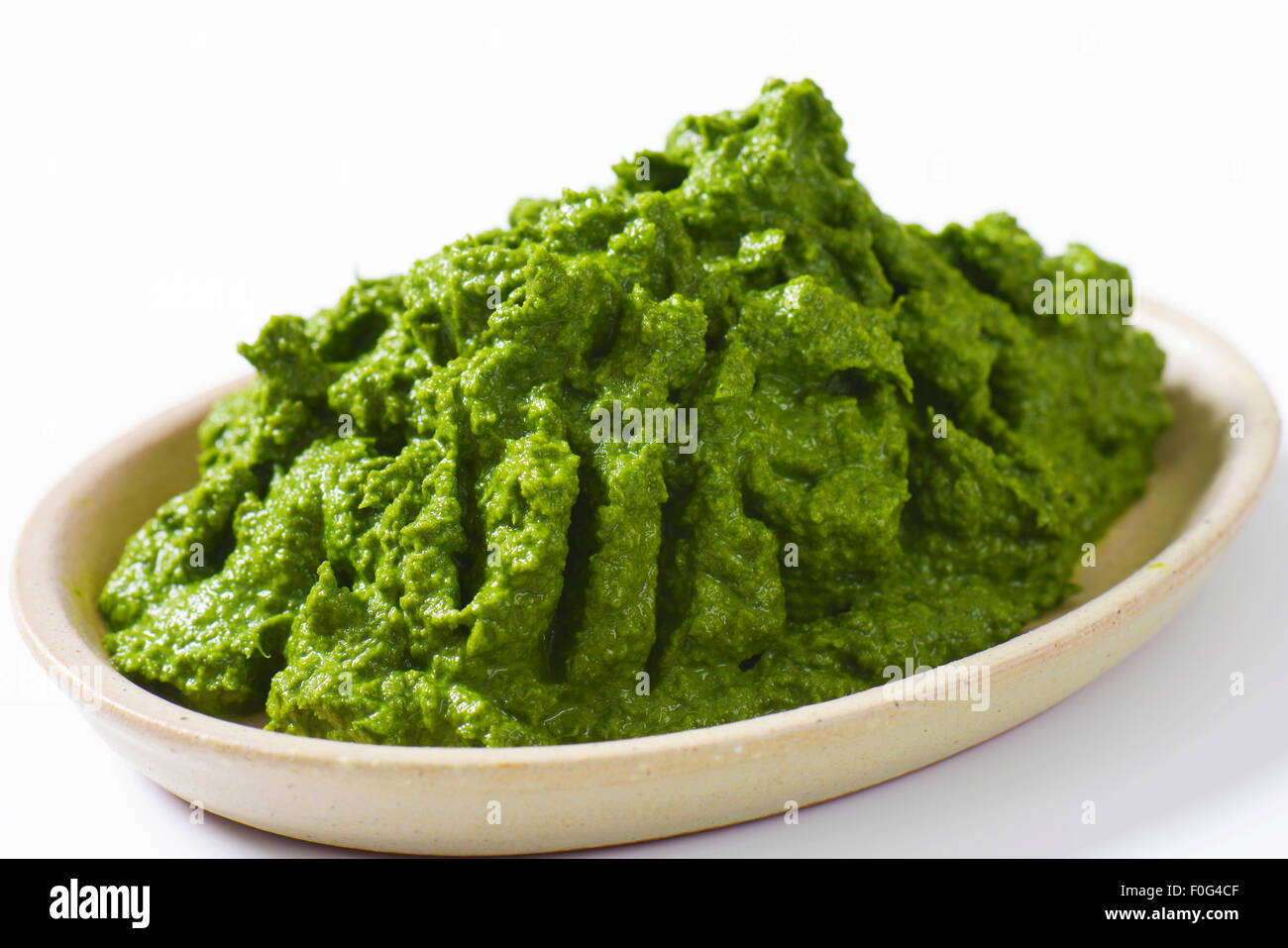Plate of homemade spinach puree Stock Photo - Alamy