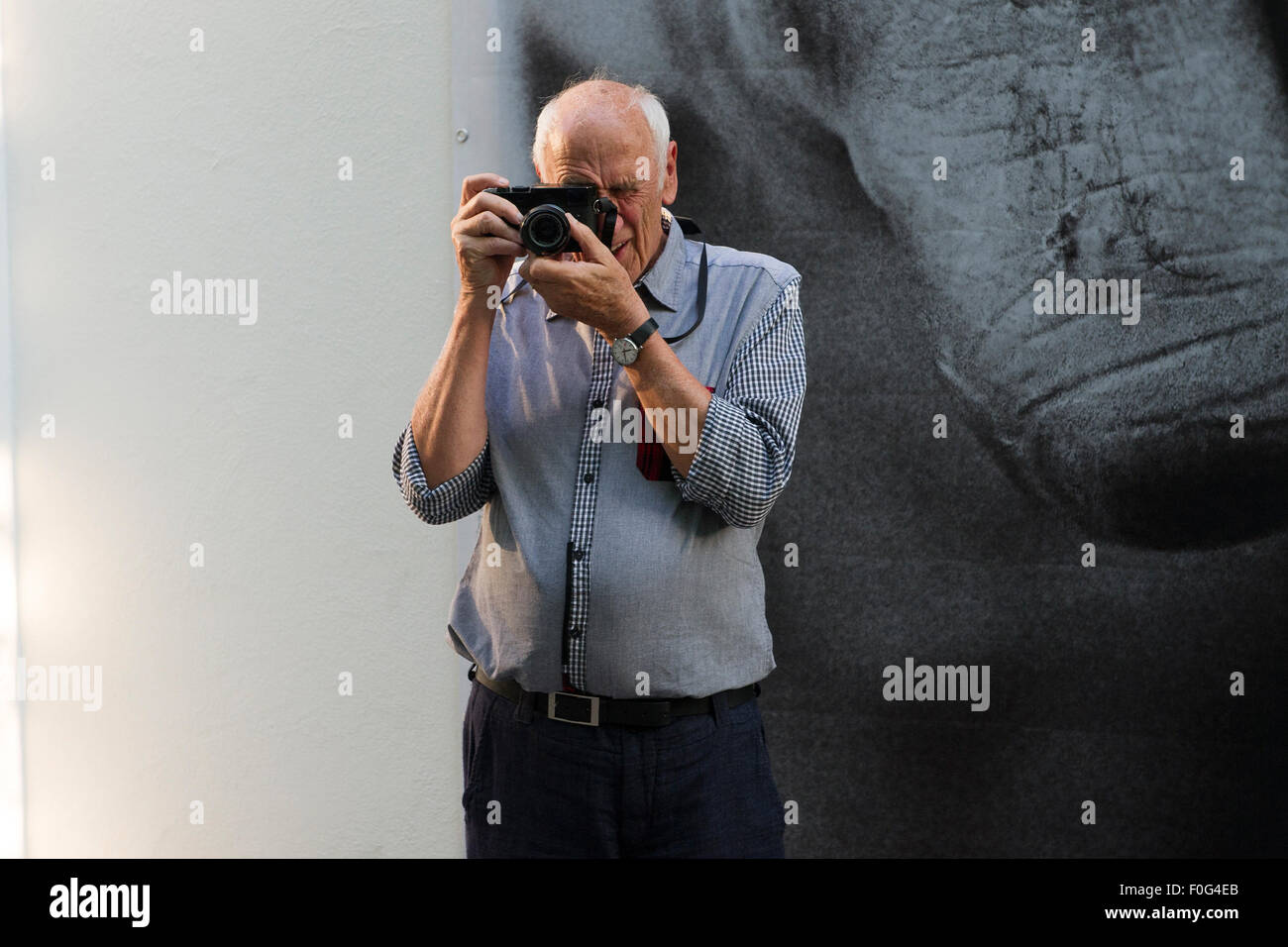 Berlin, Germany. 14th Aug, 2015. Photographer Thomas Hoepker poses with ...