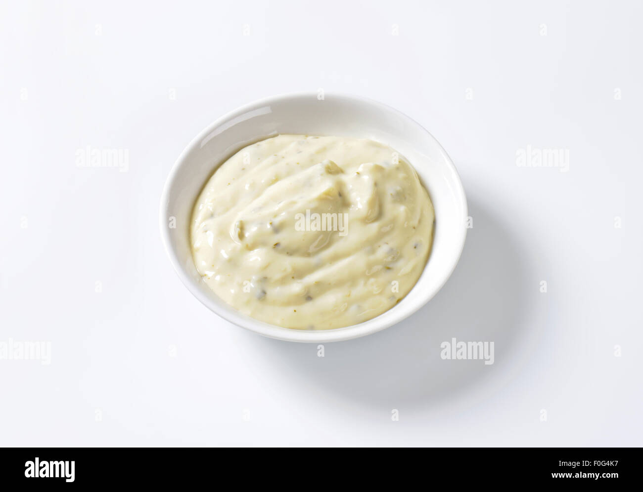 Creamy salad dressing made of mayonnaise, buttermilk, garlic, herbs ...