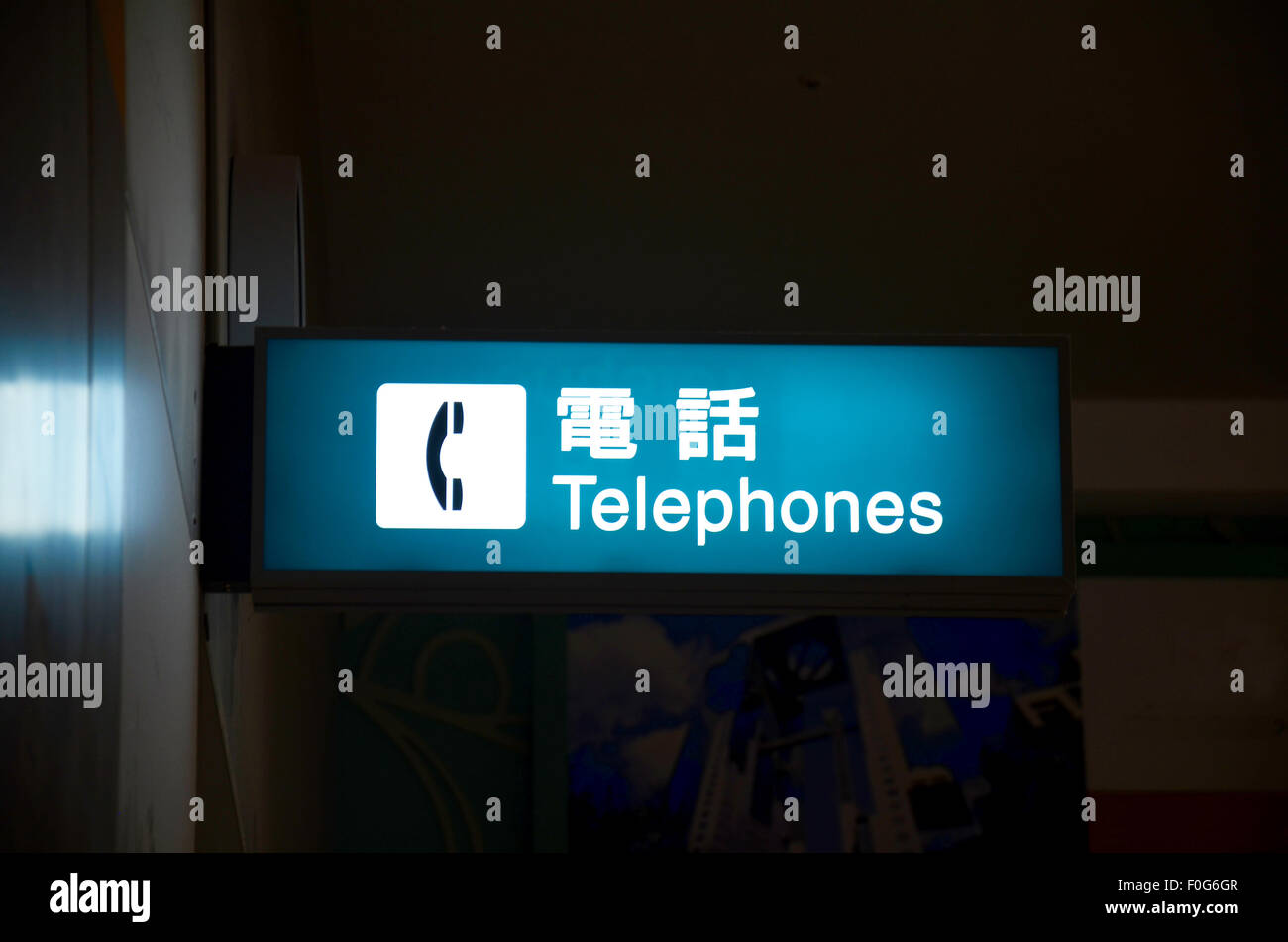 Public telephone label in Kansai Airport of Japan Stock Photo - Alamy